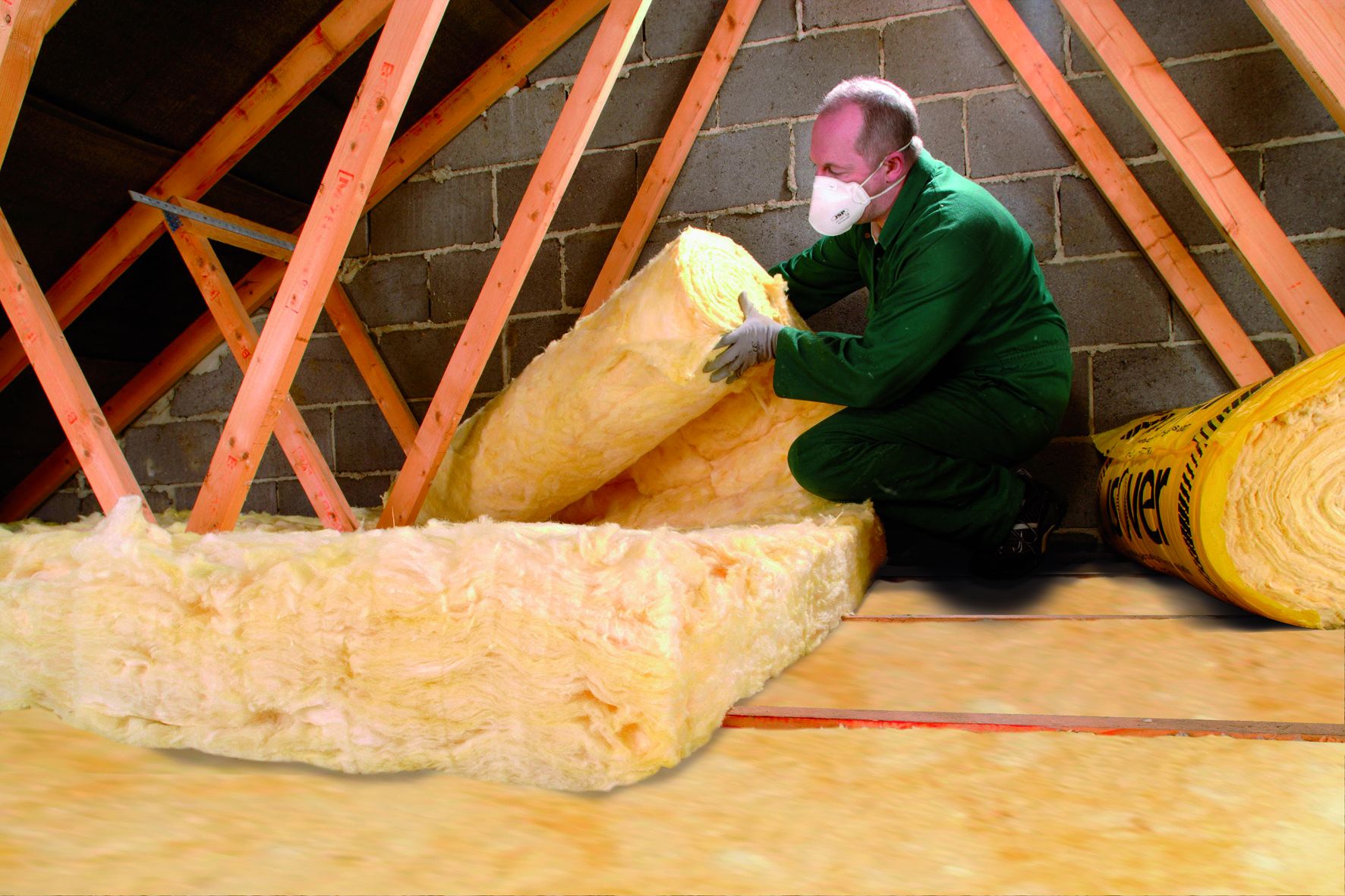 Knauf Earthwool Loft Insulation fitting by Arrow Insulation